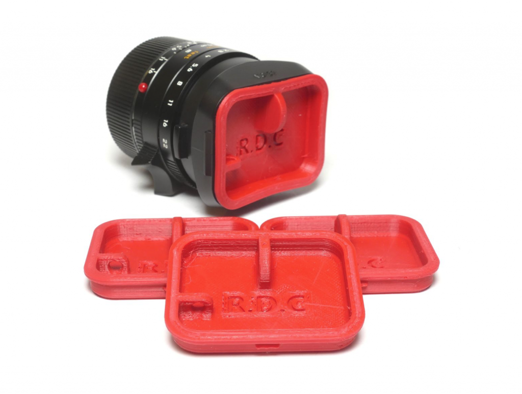 Little Red Riding hood replaces the notoriously losable Leica hood cap ...